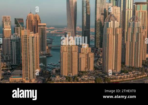 Skyscrapers of Dubai Marina with illuminated highest residential ...