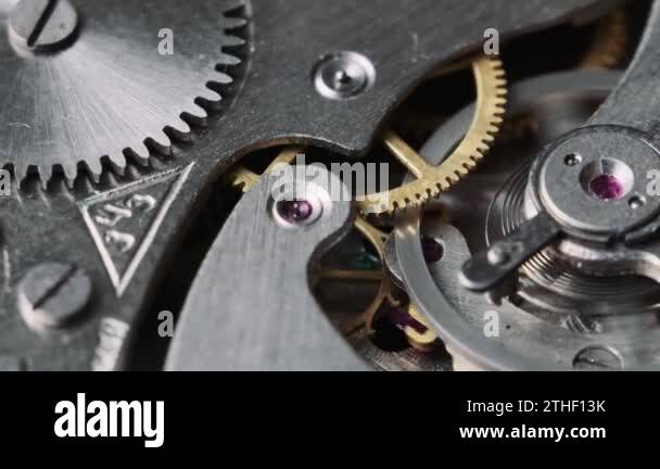 Clock mechanism rotates close-up. The working mechanism of round ...
