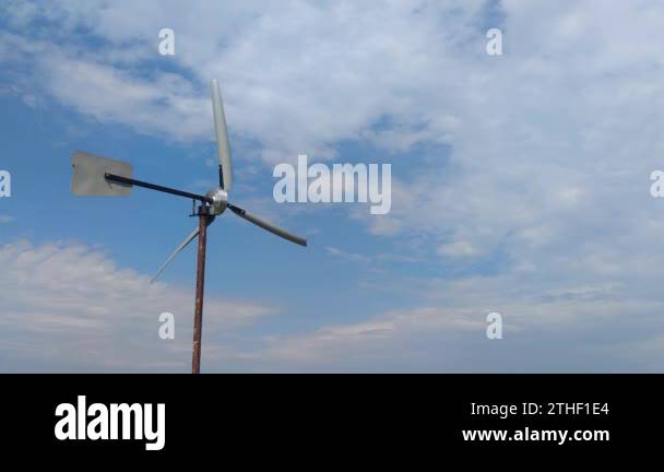 Windmill Power Generator Fan, Under Blue Sky, Shown as Power Industry ...
