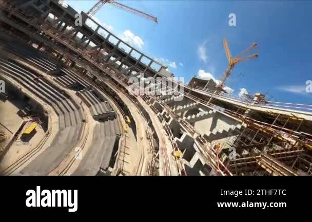 Carcasses of spectator places at large stadium building construction ...