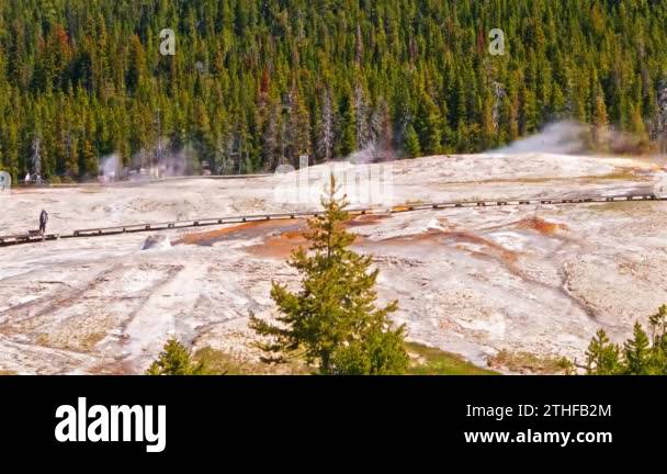 Time-lapse wide shot of Geyser Boardwalk in Wyoming. The shot was taken ...