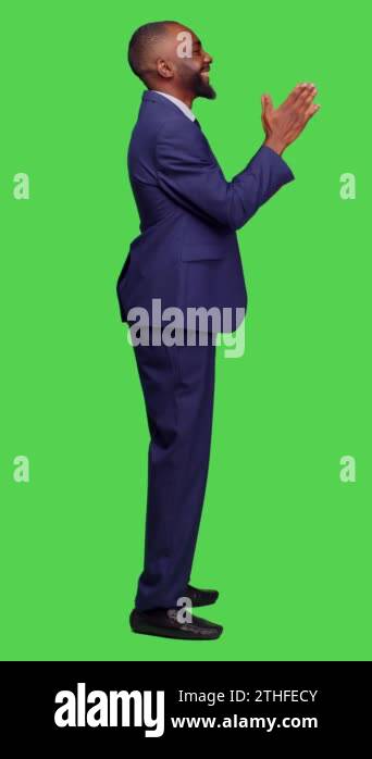 Vertical video: Profile of smiling entrepreneur in suit applauding on ...