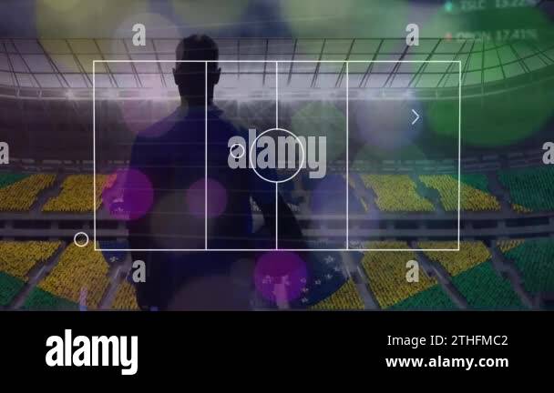 Animation of soccer field, graphs over lights and man silhouette at ...