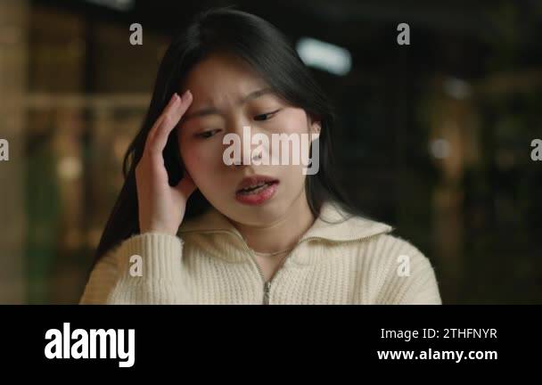 Chinese woman touching forehead Stock Videos & Footage - HD and 4K ...