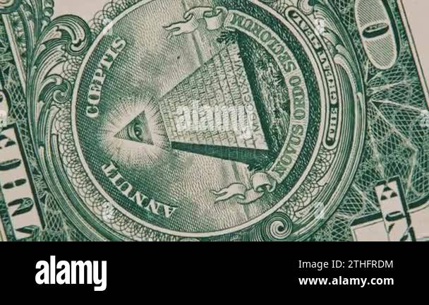Mason sign symbol of the all-seeing eye sign rotates on a one dollar ...