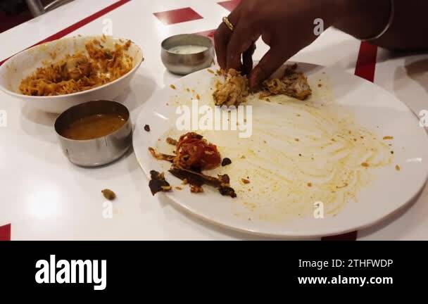 Man finishes eating Indian popular food, chicken biriyani served with ...