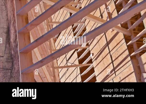 Wooden roofing framework consists of trusses beams were built while ...