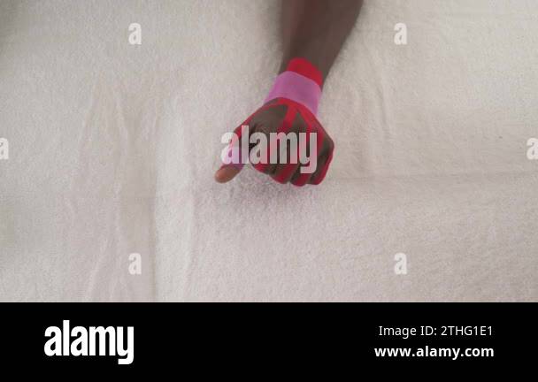 Close-up of African athlete hand. Sportsman tightening fist and ...