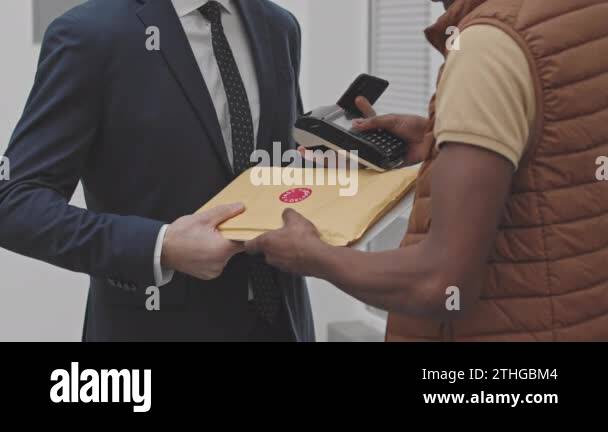 Paying documents Stock Videos & Footage - HD and 4K Video Clips - Alamy