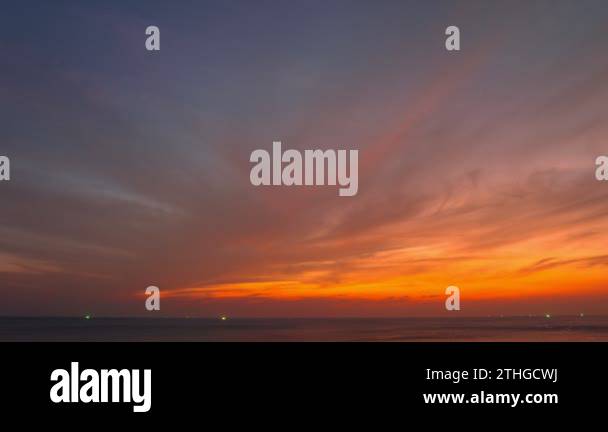 aerial hyperlapse view stunning sunset at the sea in twilight. Scene of ...