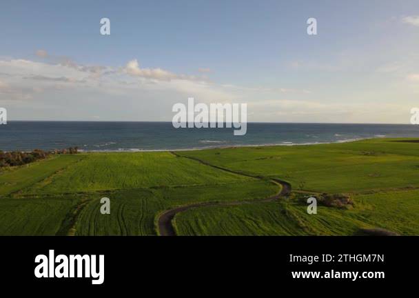 Clouds hung in the interim over the green fields. They portend a ...