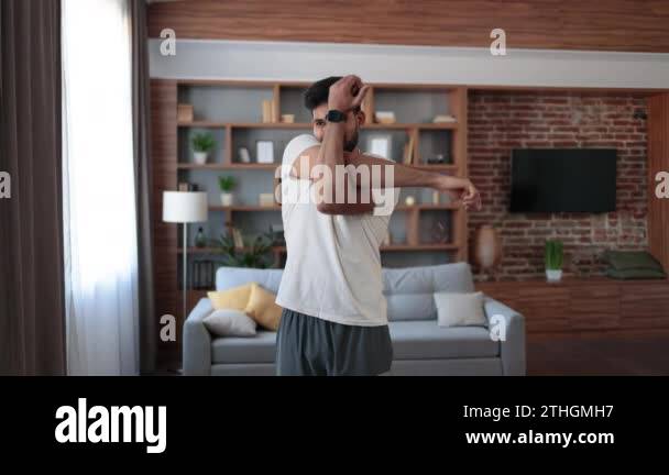 Handsome focused indian man stretching arms for bodybuilder fitness and ...