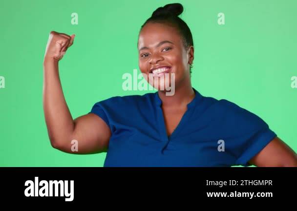 Black woman muscle flex isolated on studio background or green screen ...