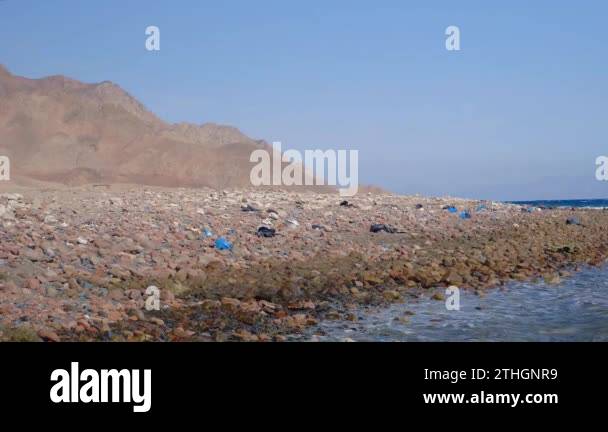 Powerful sea waves break on the coast of the Red Sea. Waves crash on a ...