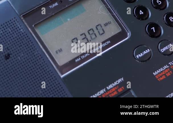 Finding a Frequency on a Black Dusty Modern Portable Digital Radio ...