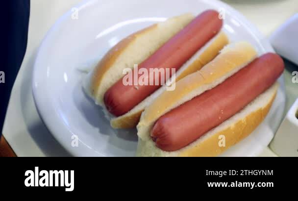 Tasty hot dogs plate Stock Videos & Footage - HD and 4K Video Clips - Alamy