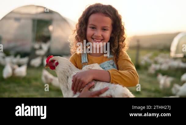 Chicken, smile and girl on a farm learning about agriculture in the ...