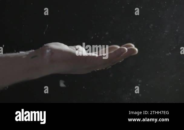 Recycled Textiles Production, a Hand Catches Falling Fabric During ...