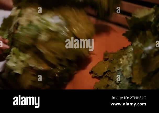 Close-up massaging male back with birch broom in Russian sauna ...