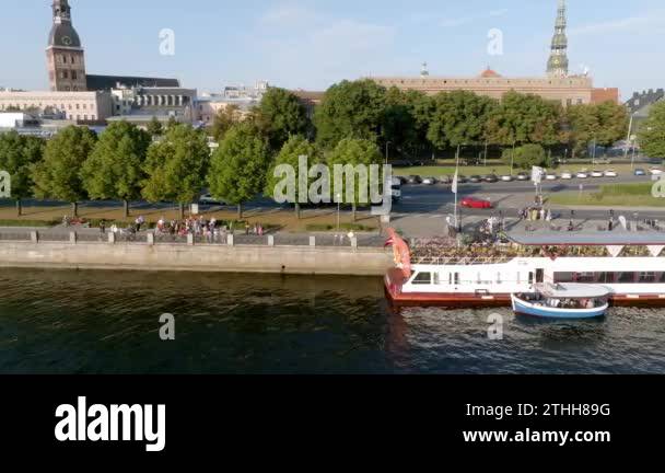 Small cruise ship taking tours down the river Daugava in Riga, Latvia ...