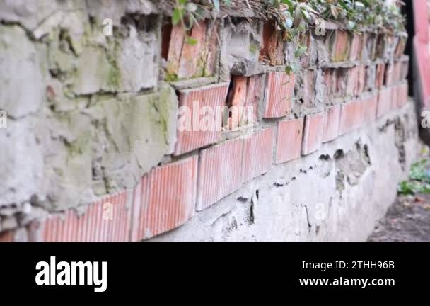 Destroyed red brick. The impact of the environment on the building ...