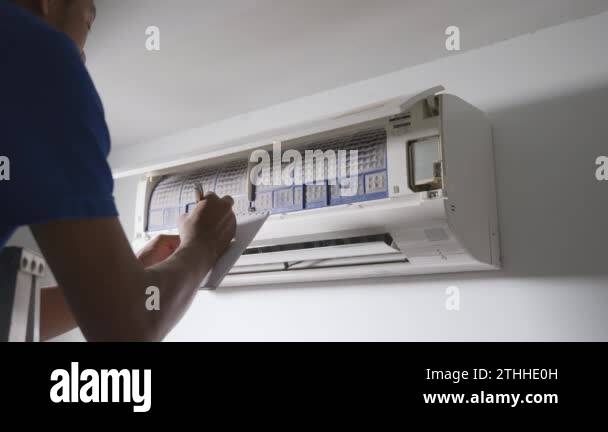 Technician checking air conditioner Stock Videos & Footage - HD and 4K ...