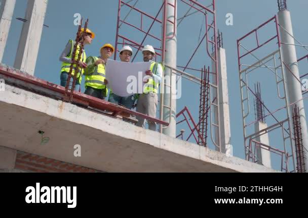 Team group of contractor and architect with foreman explaining about ...