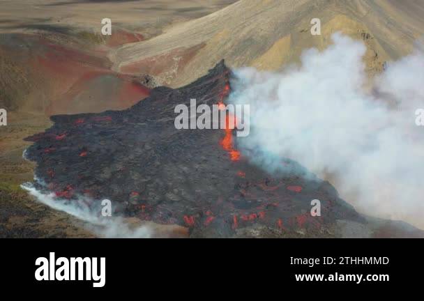 HD Aerial Drone View Of Volcanic Fissure Eruption Surrounded By Cooling ...