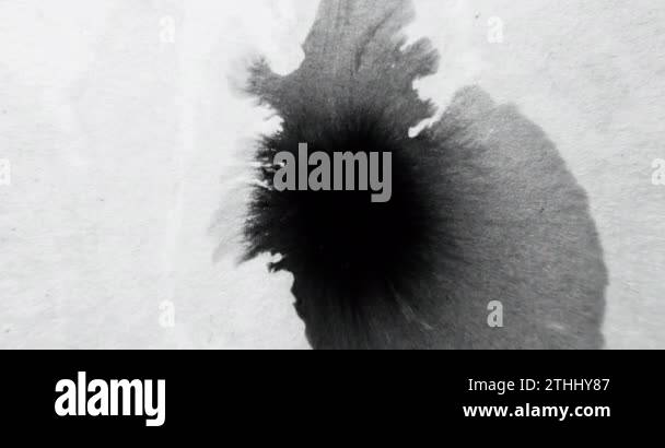 Black paint water drop. Wet stain flow. Transition overlay for intro ...