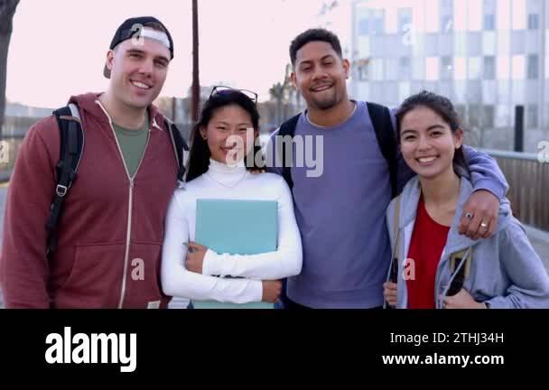 Happy portrait of multiracial group of united college student friends ...