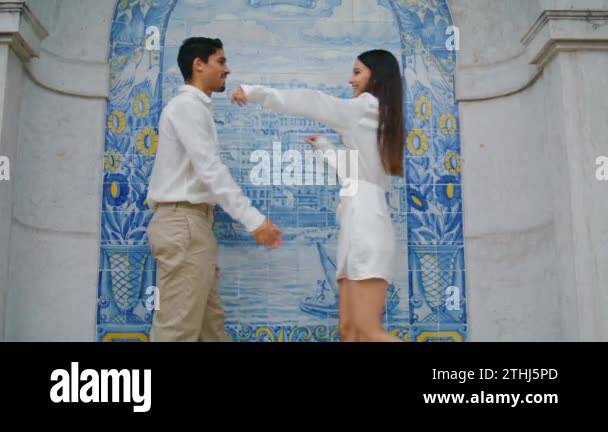 Affectionate newlyweds embracing in ceramic tile place. Hispanic ...