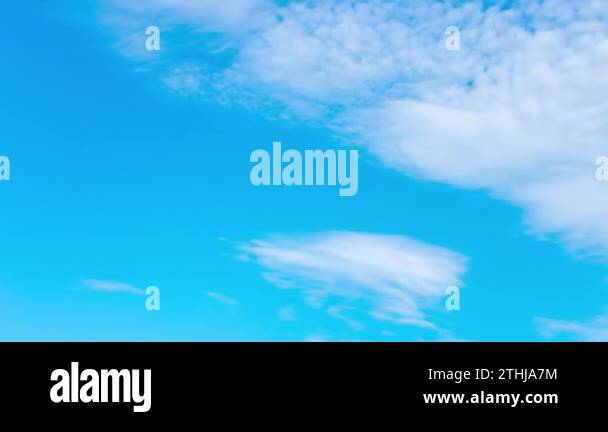 A sunny summer sky changing from blue and cloudless to bright with ...