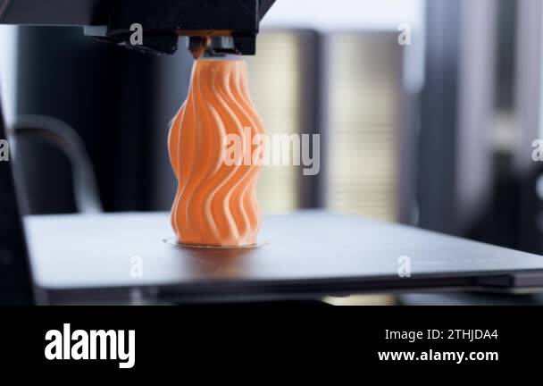 3D Printer, 3D Printing orange object. 4.0 industrial revolution ...