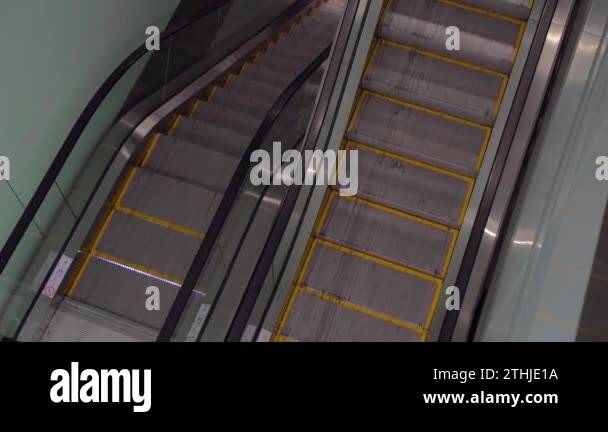 Escalator steps are moving. Architecture of a modern building. High ...