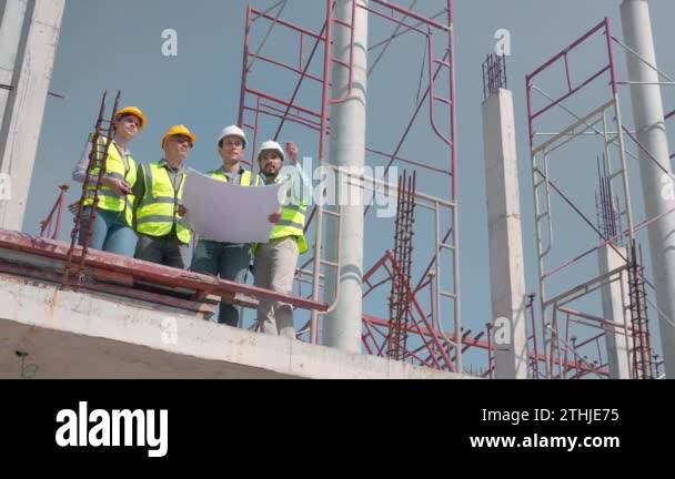 Team group of contractor and architect with foreman explaining about ...