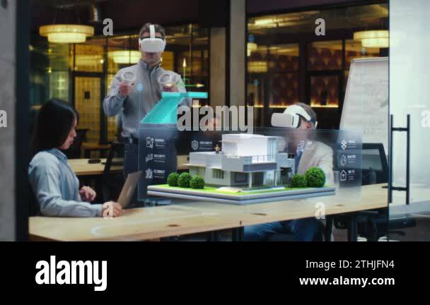 Male designer uses VR headset and wireless controllers, presents smart ...