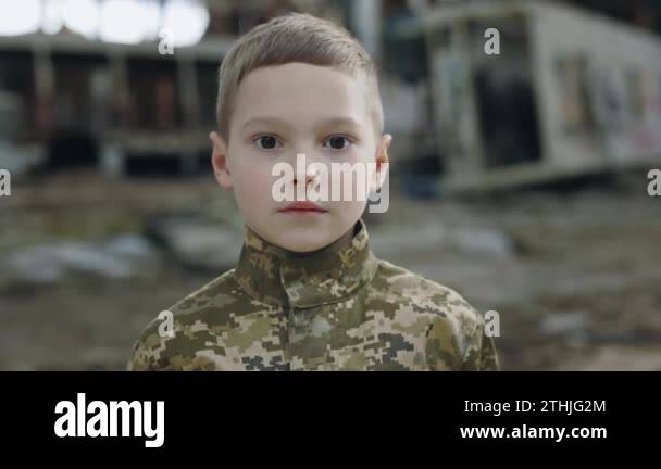 Portrait of the Little Soldier Wearing Military Uniform Standing on the ...
