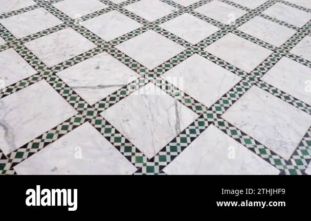 Traditional Moroccan floor with zellige mosaic tiles and marble ...