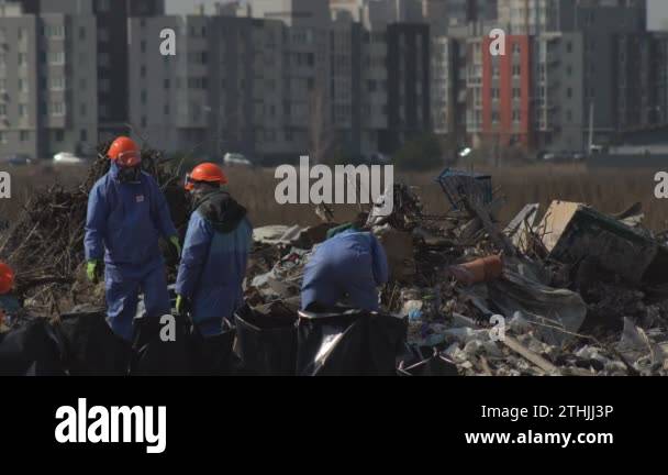 Garbage sorting concept. Men and women put various waste into special ...