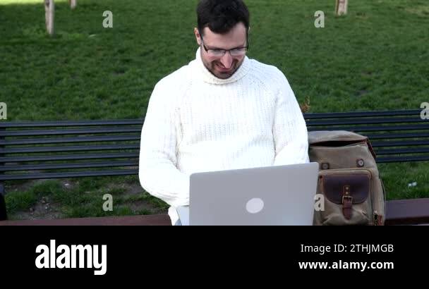 Park laptop computer park bench sitting Stock Videos & Footage - HD and ...