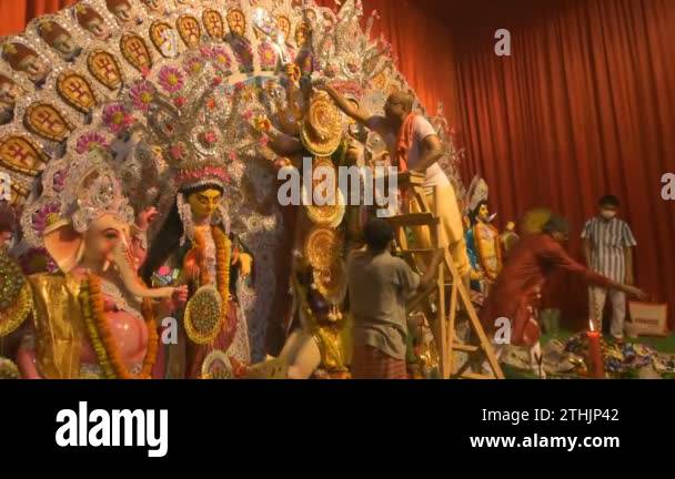 Howrah, India - October 15th, 2021 : Hindu priest decorating idol of ...