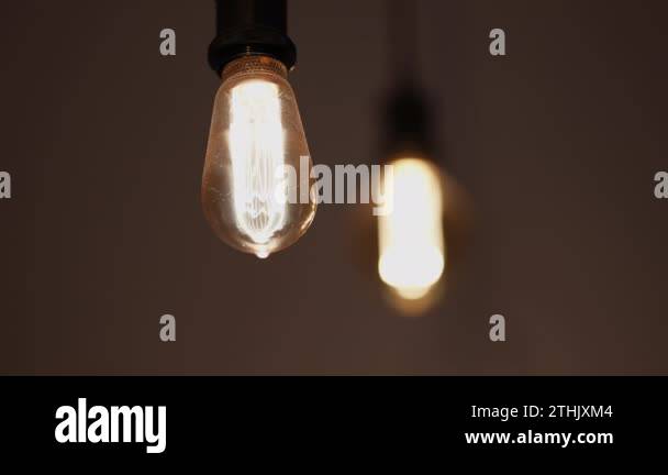 Turning light ON. Ceiling bulb electricity switching ON. Idea eureka ...