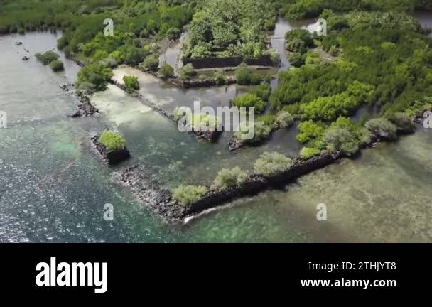 Aerial footage of Nan Madol prehistoric ruined stone city built of ...