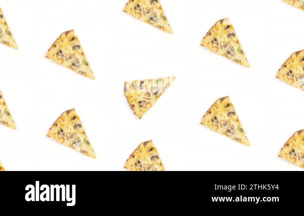 4k Pizza patern. Group of triangular pizza slices rotates around its ...