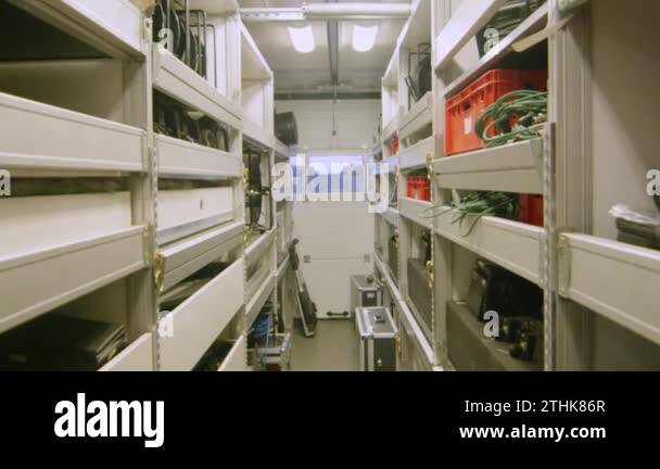 Storage room with equipment as camera and wires for cameraman in ...