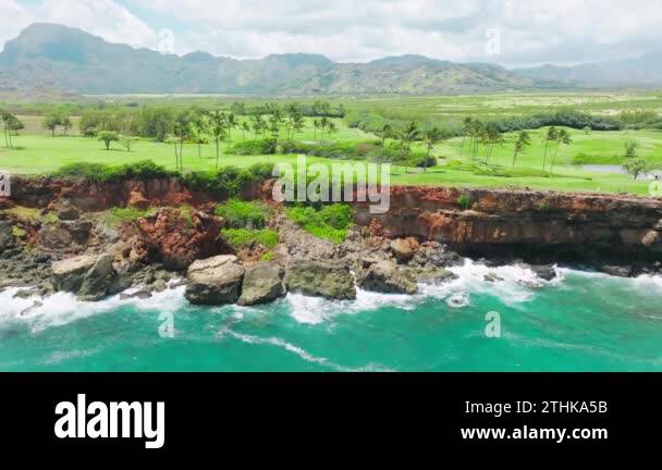 Scenic aerial panorama of waterfront golf club and course on Kauai ...