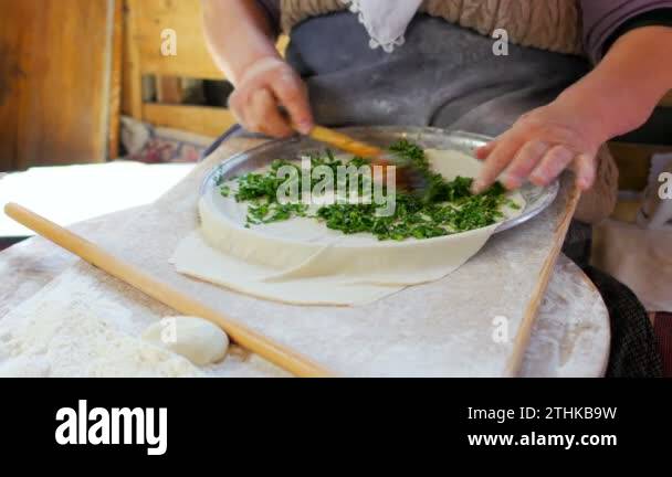 Woman preparing traditional food gozleme Stock Videos & Footage - HD ...