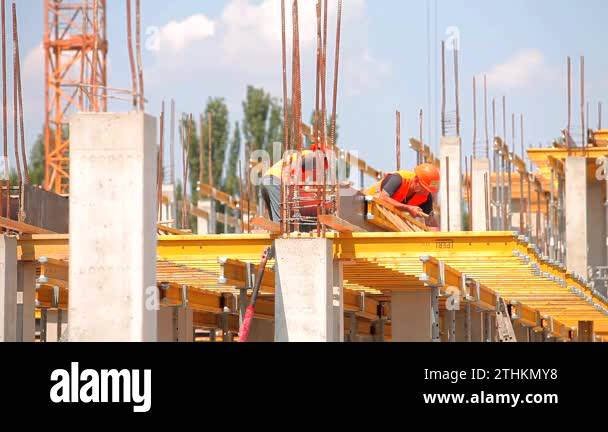 Builders make formwork at the construction site. Construction process ...