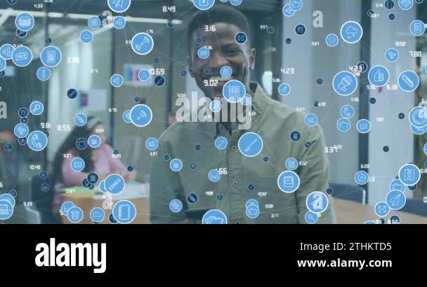 Animation of connected icons with numbers over smiling african american ...
