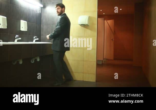 Man in public restroom Stock Videos & Footage - HD and 4K Video Clips ...